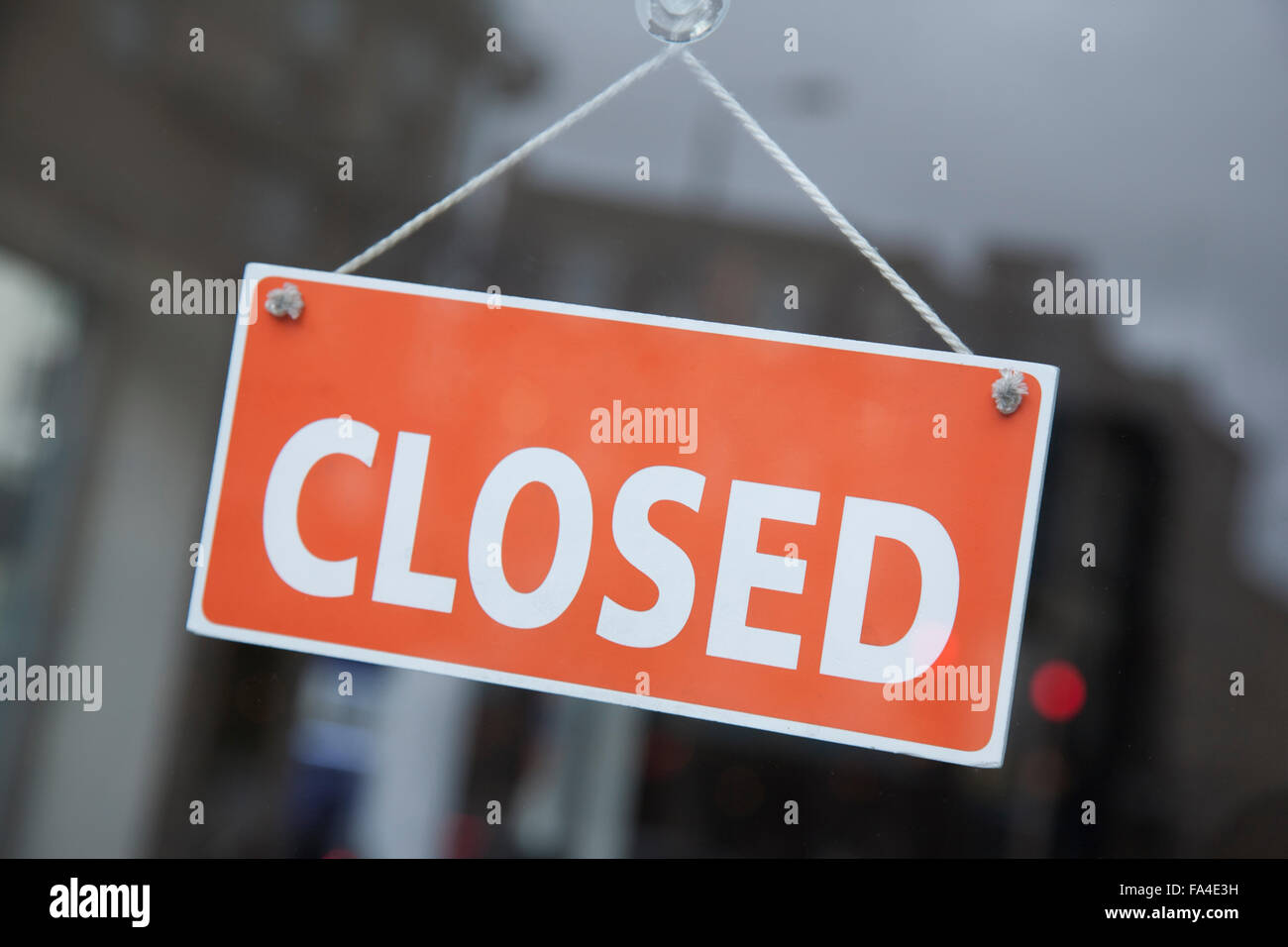 Orange Closed Sign on Shop Door Stock Photo - Alamy