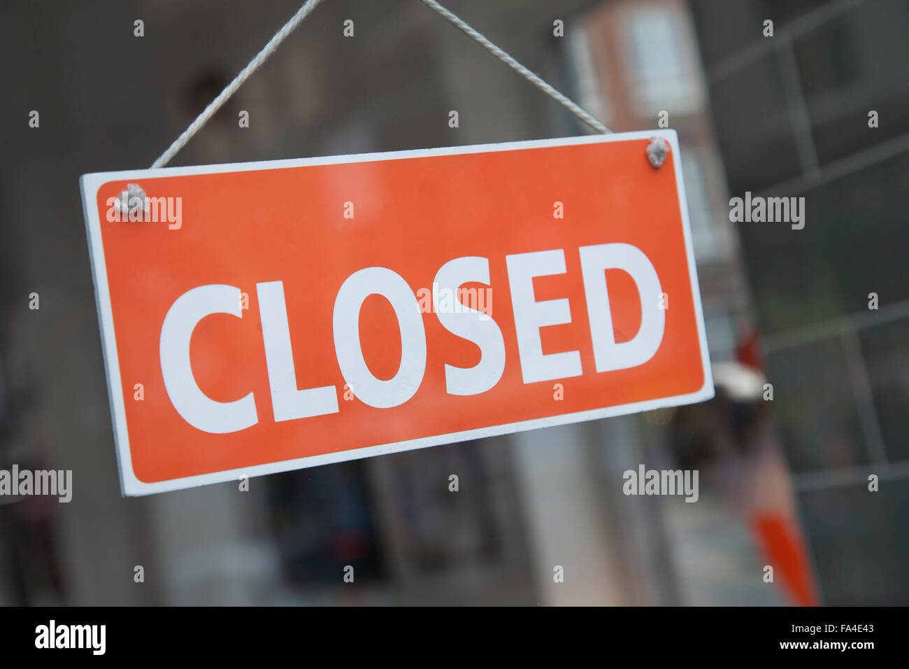 Orange Closed Sign on Shop Door Stock Photo - Alamy