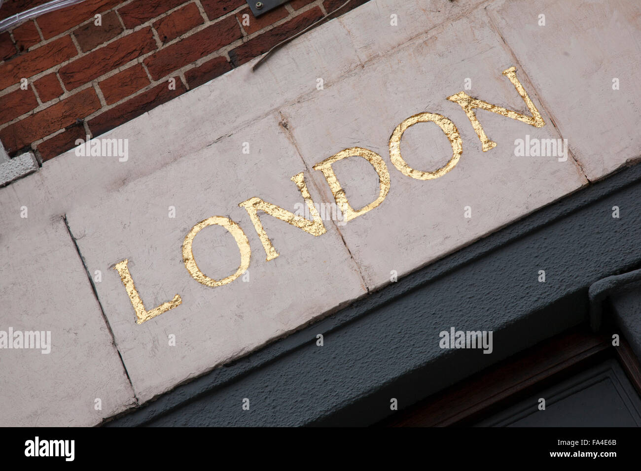 London Sign on Brick Wall Background Stock Photo - Alamy
