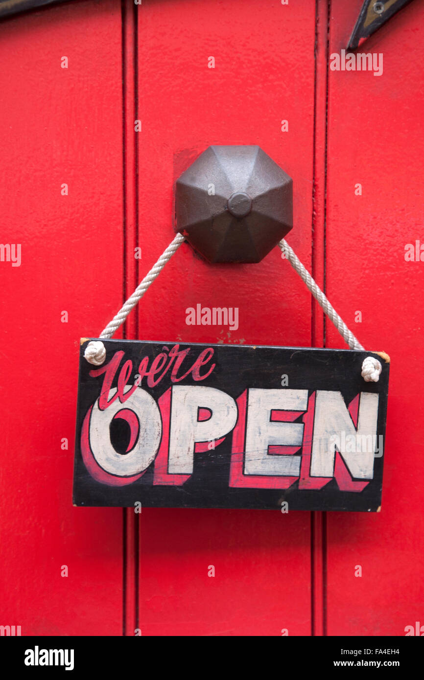 Open Sign on Red Door Background Stock Photo - Alamy