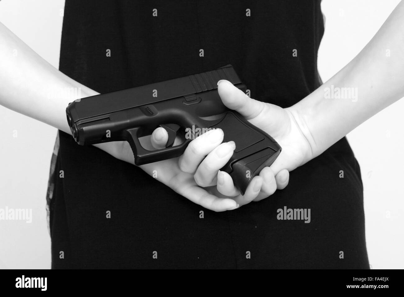 Beautiful woman gun Black and White Stock Photos & Images - Alamy