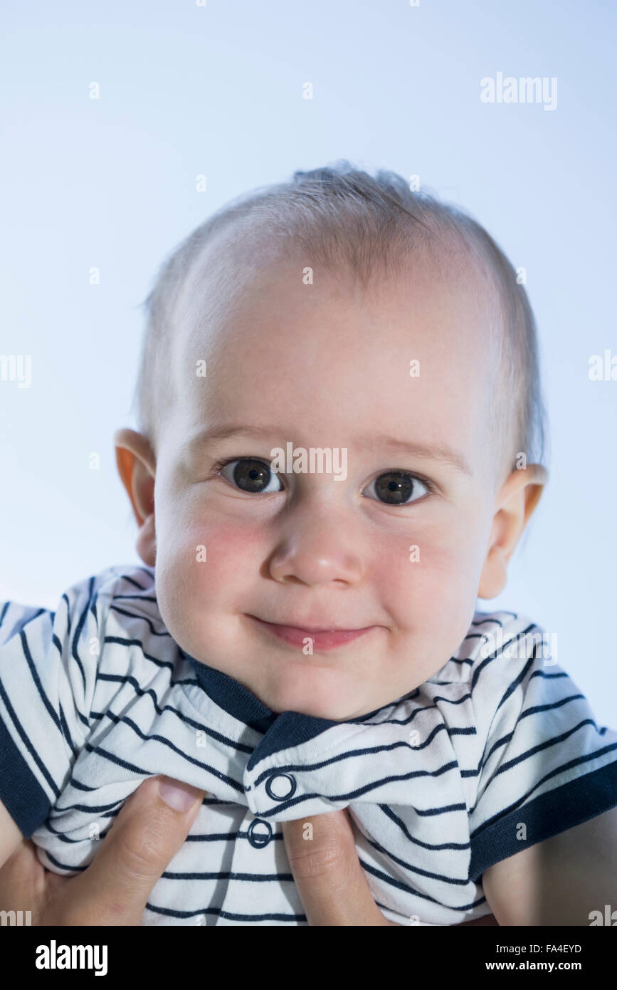 Mother lifting up her baby boy, Munich, Bavaria, Germany Stock Photo ...