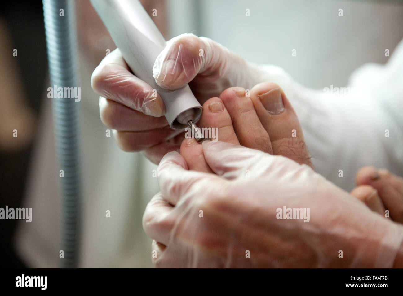 Chiropodist during the chiropody Stock Photo - Alamy
