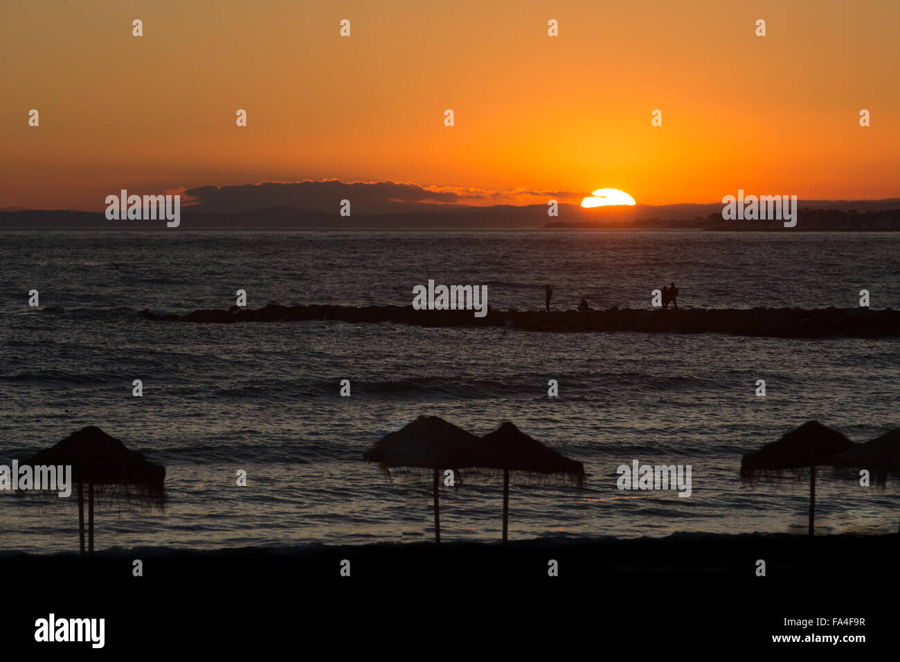 Spanish sunset on the beach Stock Photo - Alamy