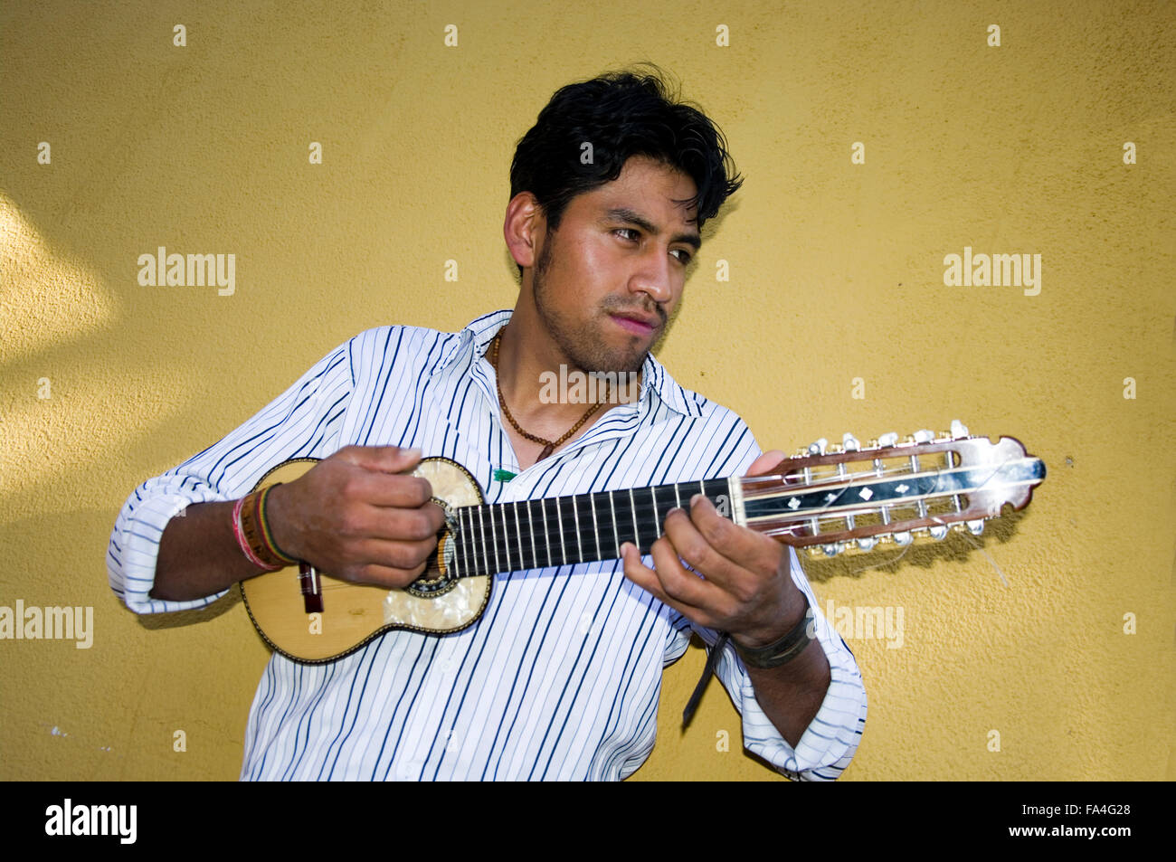 Play charango hi-res stock photography and images - Alamy