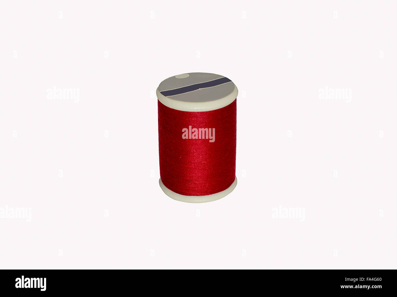 Red bobbin thread Stock Photo - Alamy