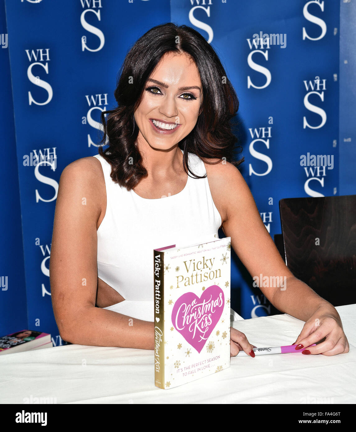 Romford, London, UK. 201215. Vicky Pattison signs copies of her books ...