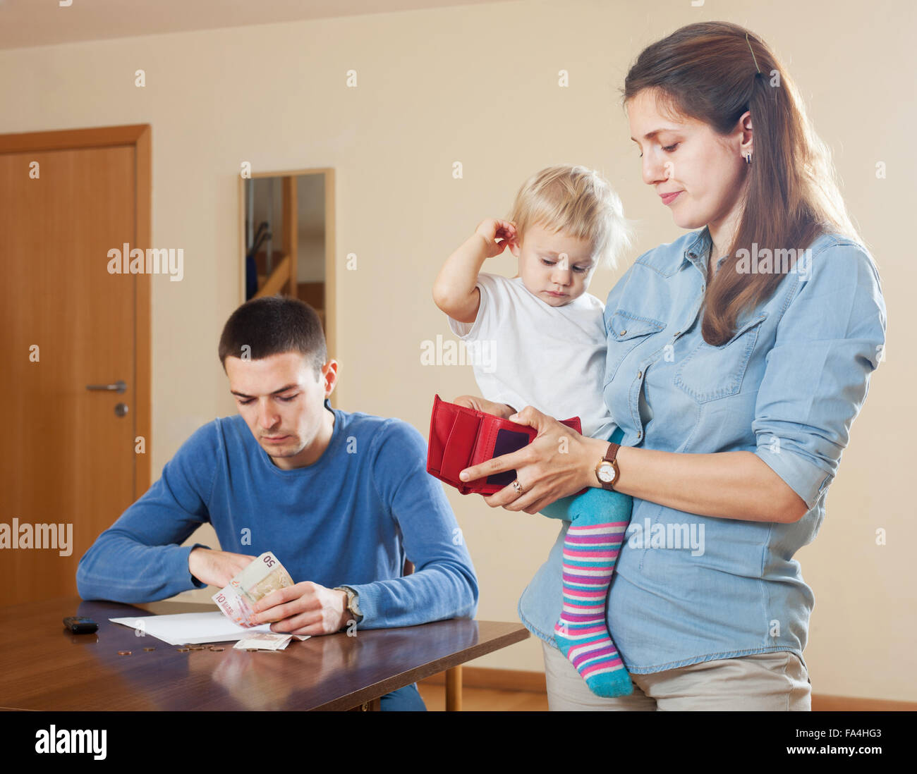 Financial problems in the family with baby at home Stock Photo - Alamy