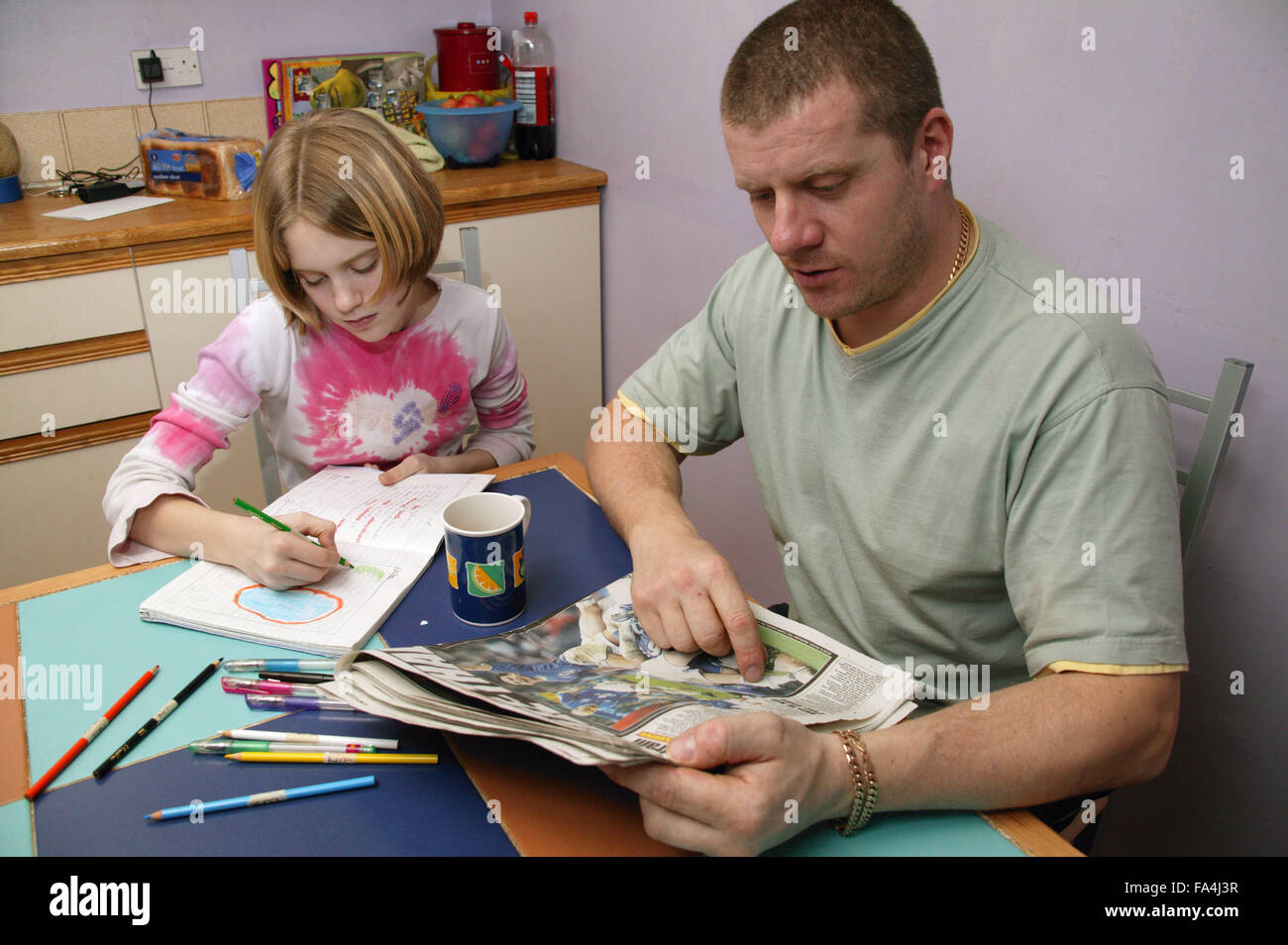Children doing drawing work parents hi-res stock photography and images ...