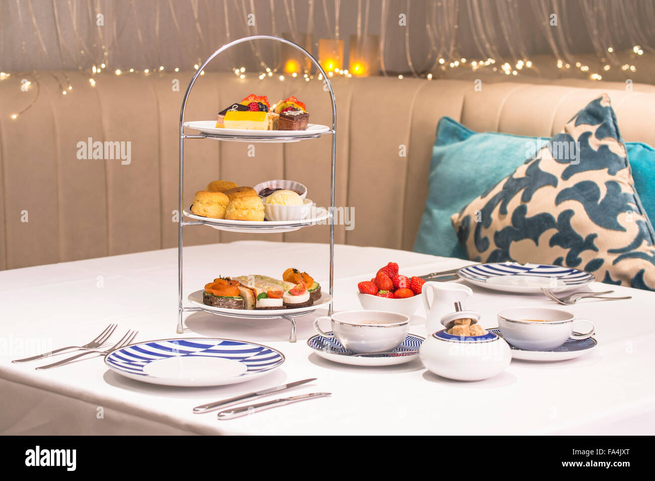 High tea is served in a restaurant with all the tradition trimmings ...