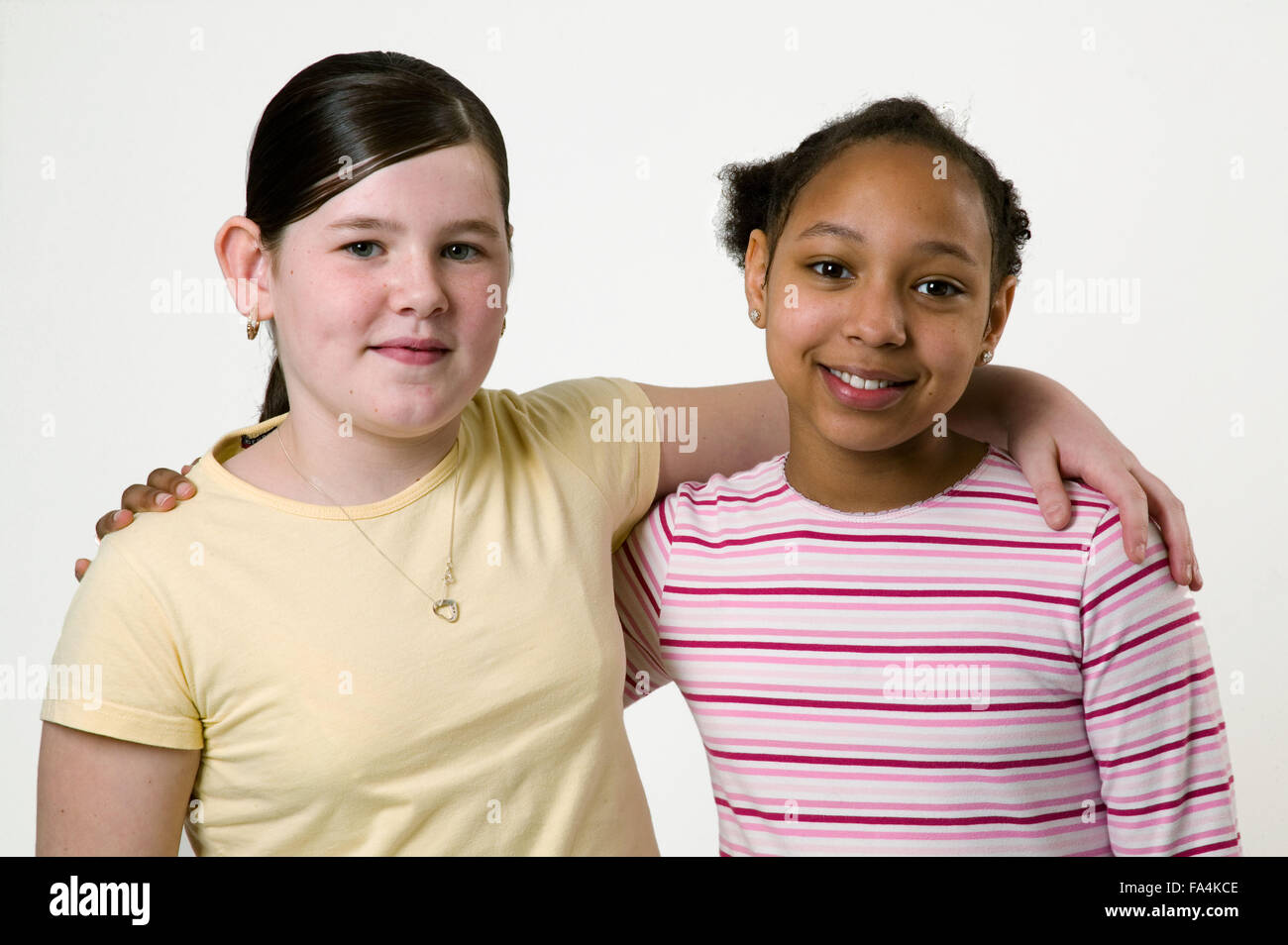 Two friends; with their arms around each other Stock Photo - Alamy