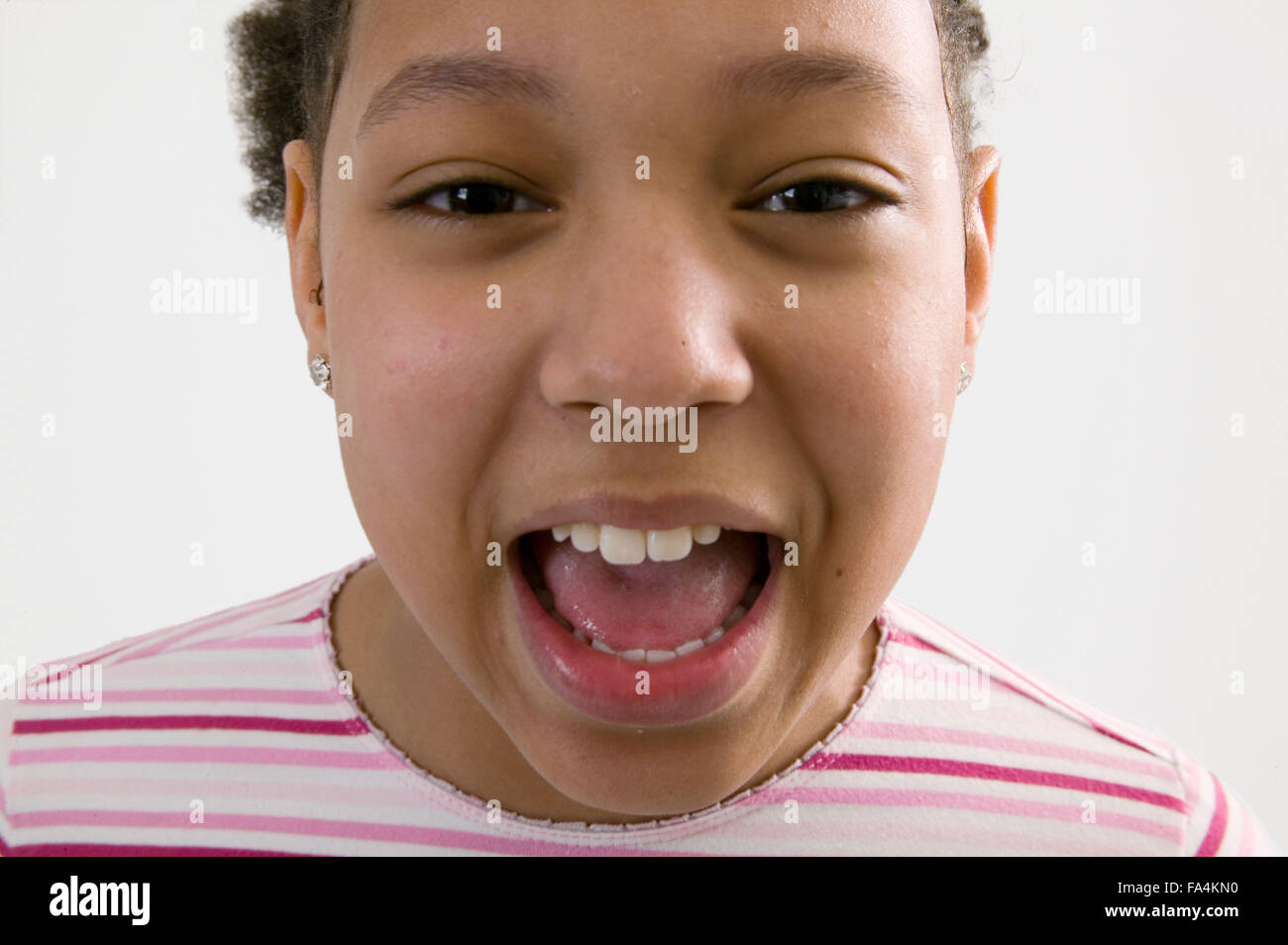 Young girl shouting Stock Photo - Alamy