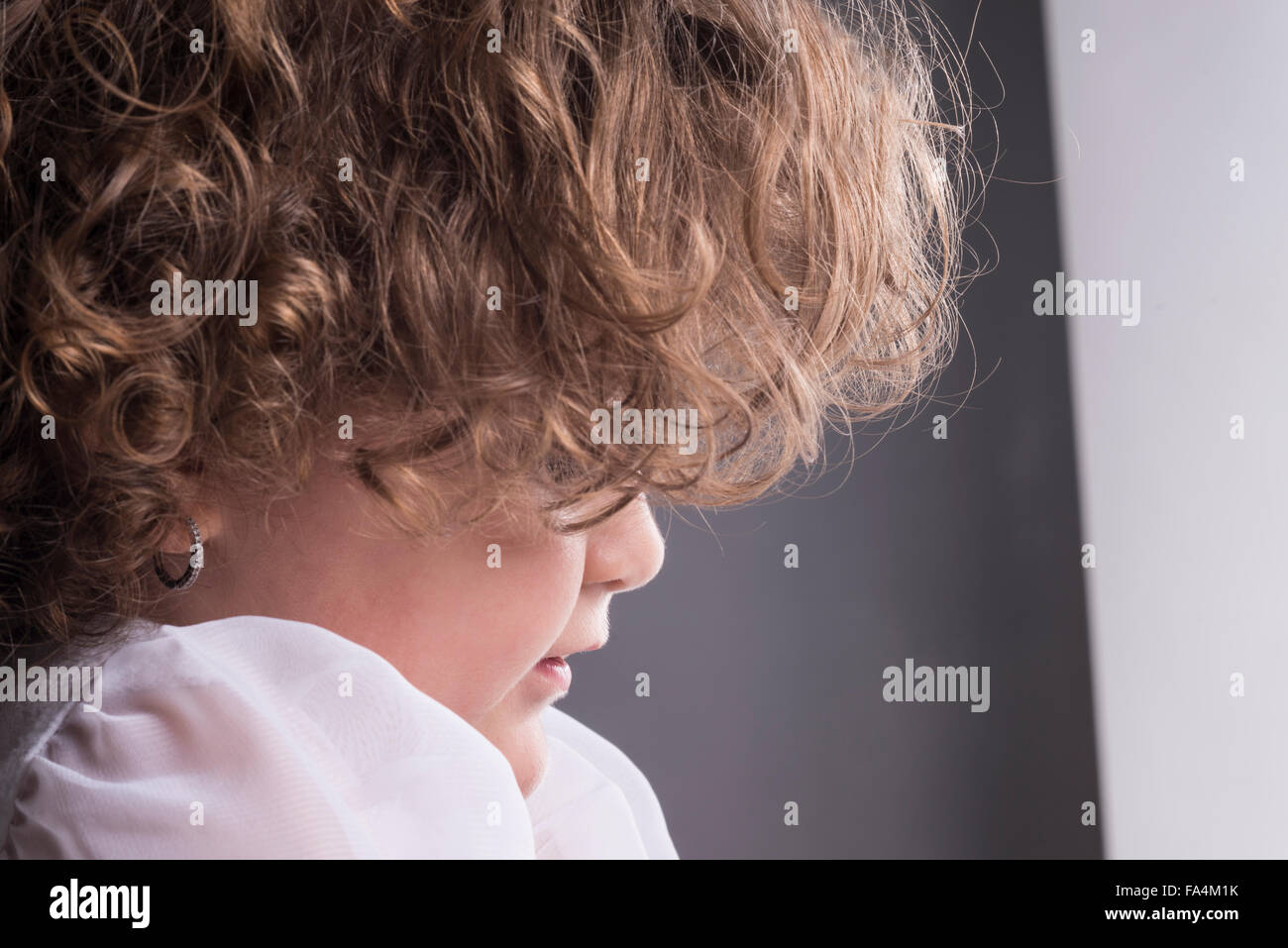Thinking blonde boy hi-res stock photography and images - Alamy