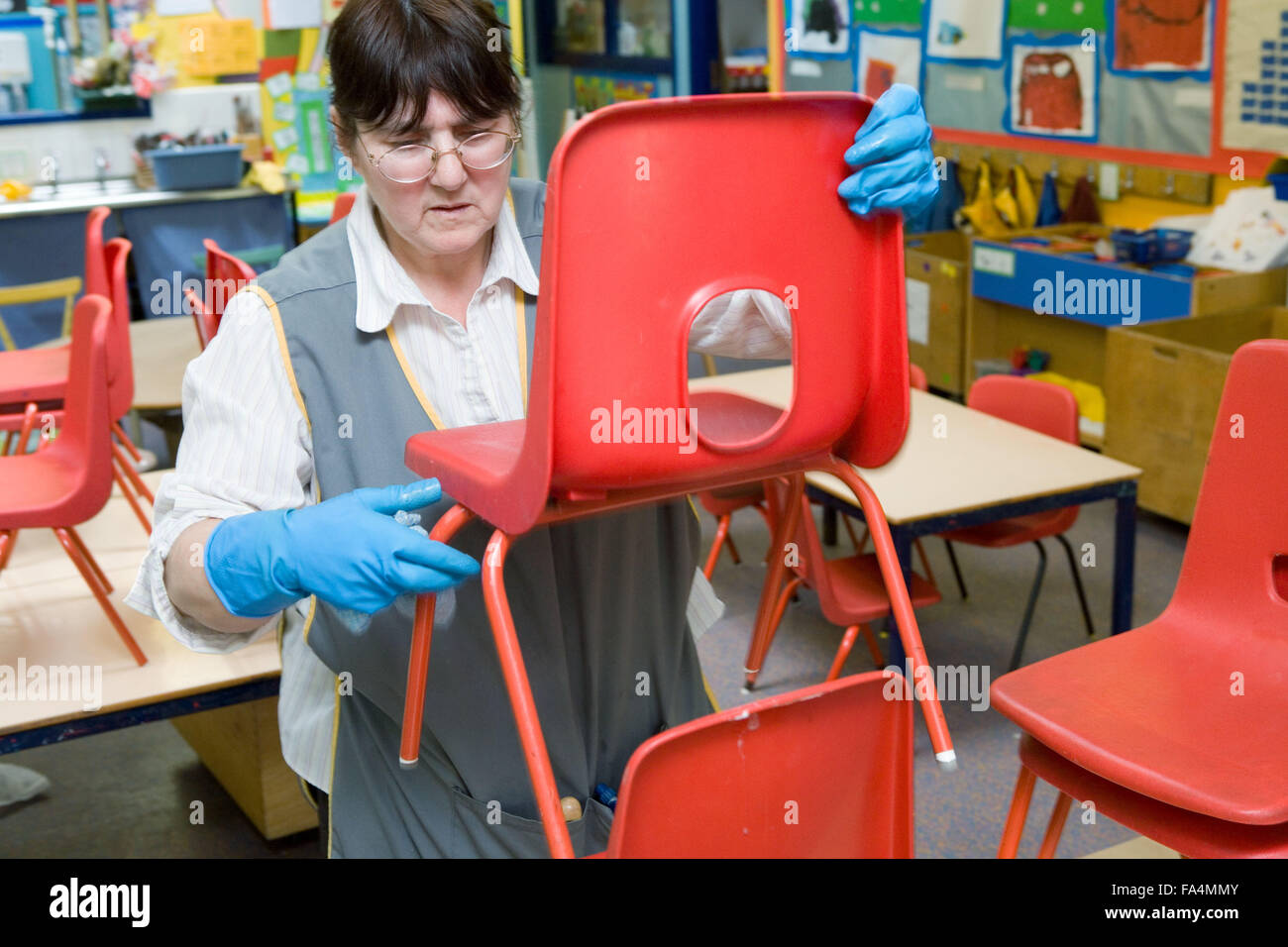 School domestic stacking plastic chairs in primary school classroom ...