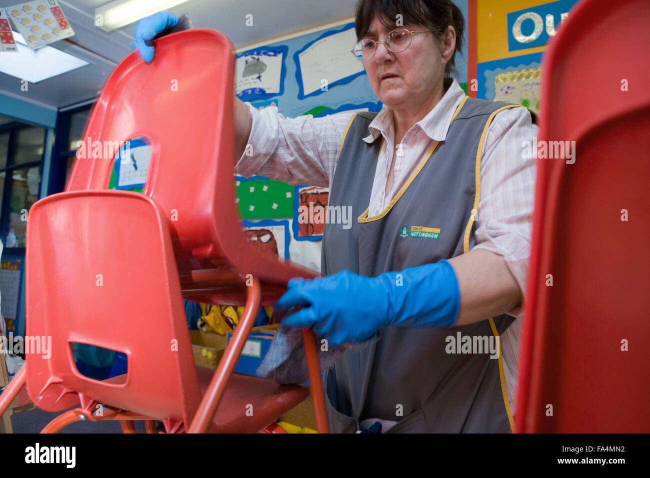 School domestic stacking plastic chairs in primary school classroom ...