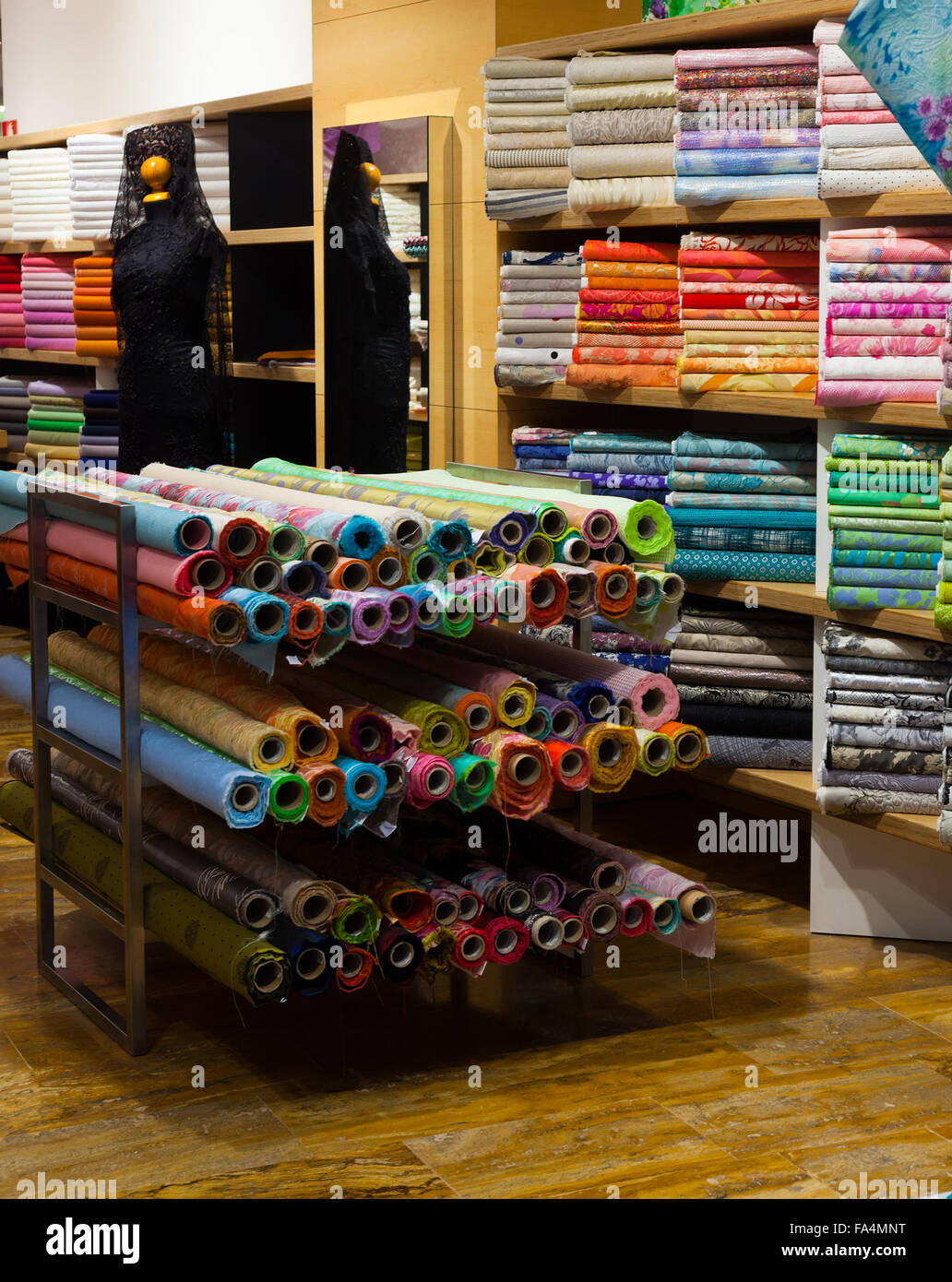 Interior of tissue shop with fabrics Stock Photo - Alamy