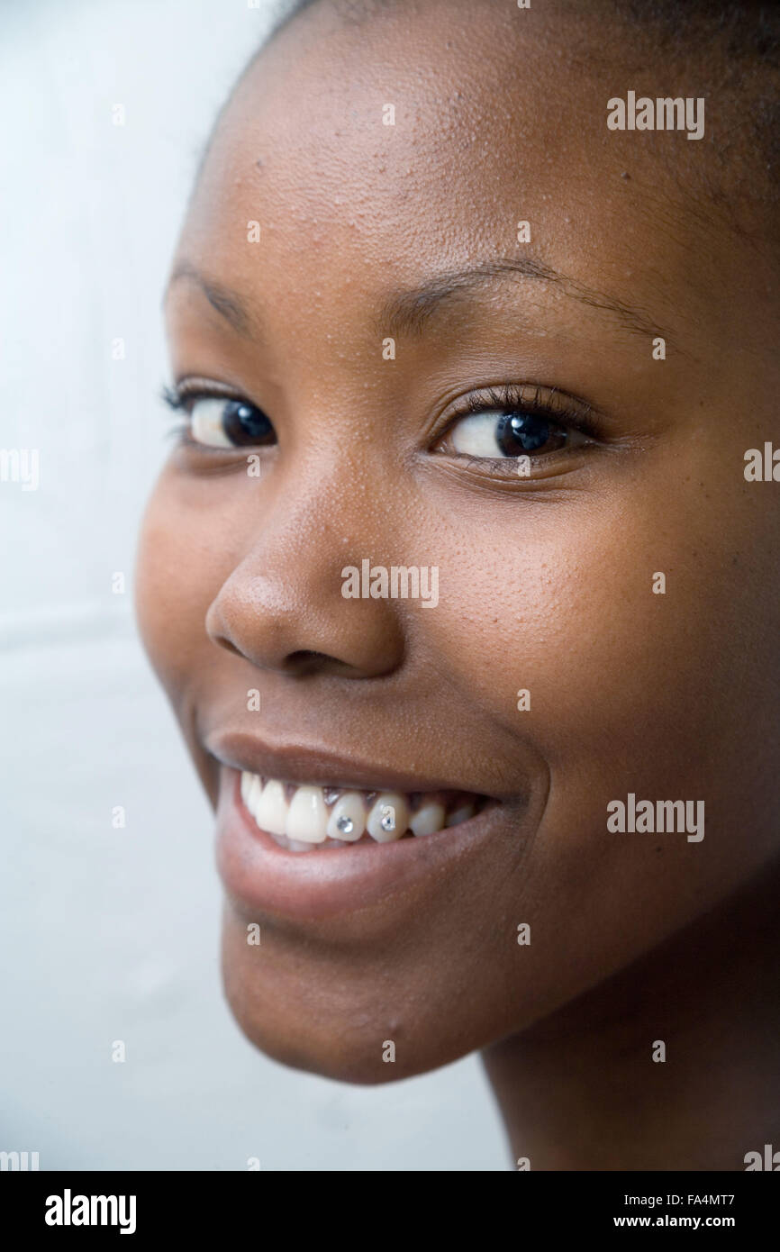 Portrait of girl smiling Stock Photo - Alamy