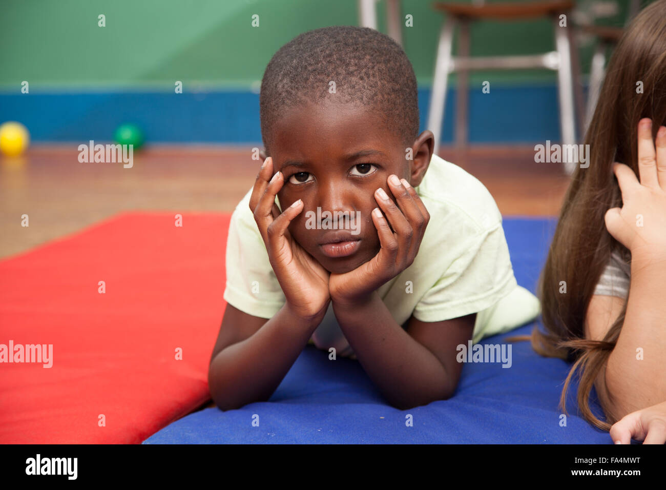 African child concentrated and little bit angry Stock Photo - Alamy