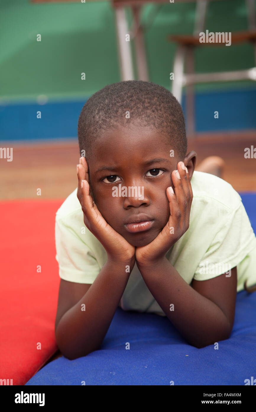 African child concentrated and little bit angry Stock Photo - Alamy