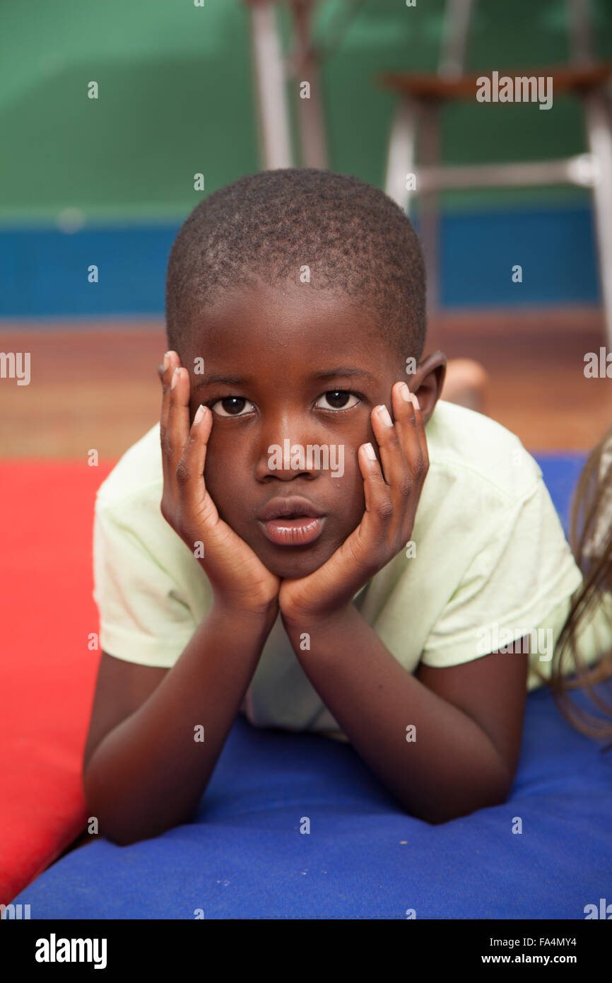 African child concentrated and little bit angry Stock Photo - Alamy