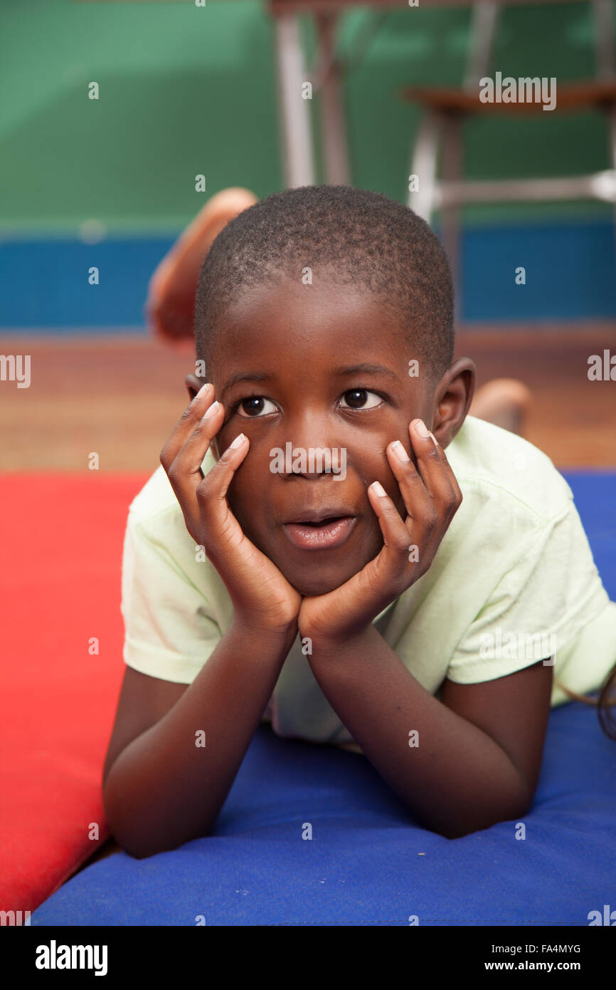 African child concentrated and little bit angry Stock Photo - Alamy