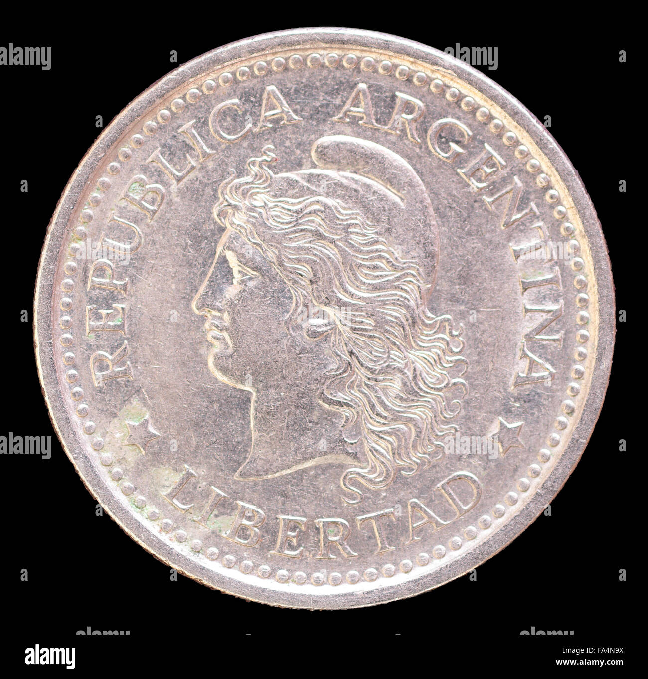 The head face of one peso coin, issued by the Republic of Argentina in ...