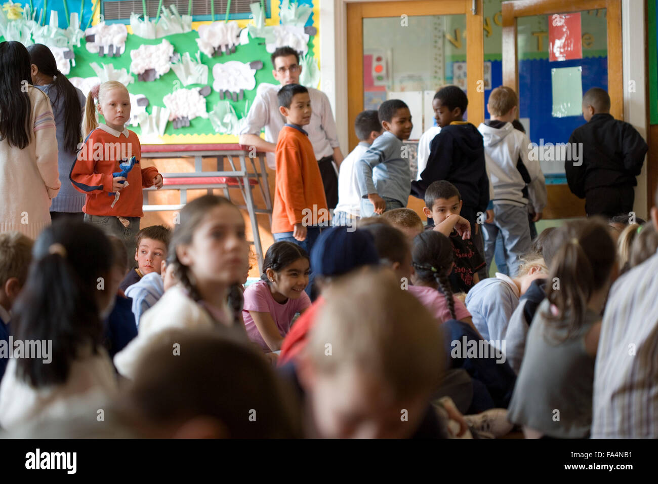 Children leaving classroom after school assembly Stock Photo - Alamy