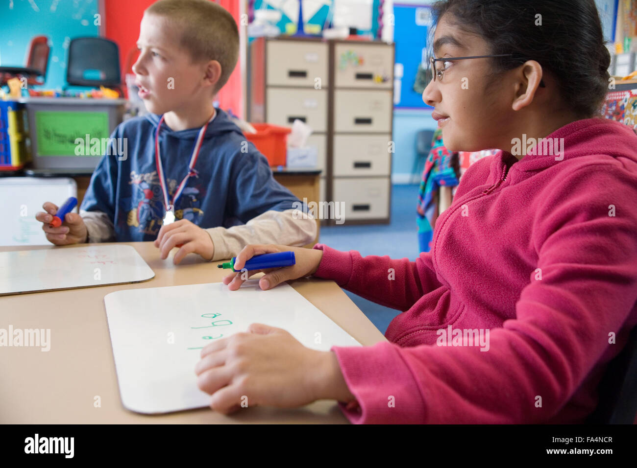 Schoolchildren in class multiracial hi-res stock photography and images ...