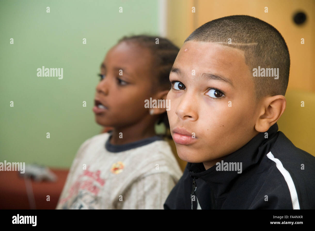 Portrait of boy looking serious Stock Photo - Alamy
