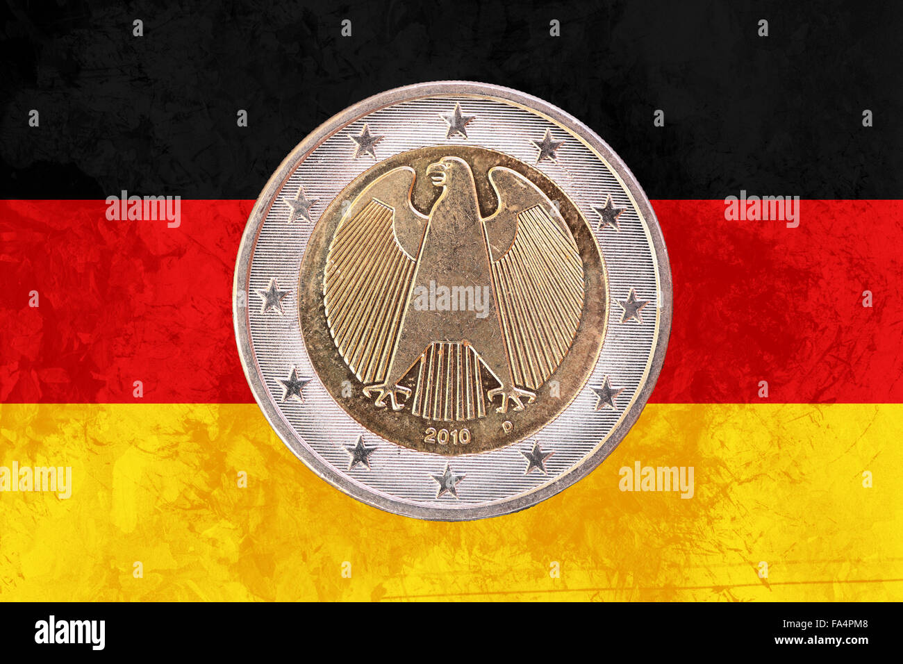 Two euros coin from Germany isolated on the national german flag as ...