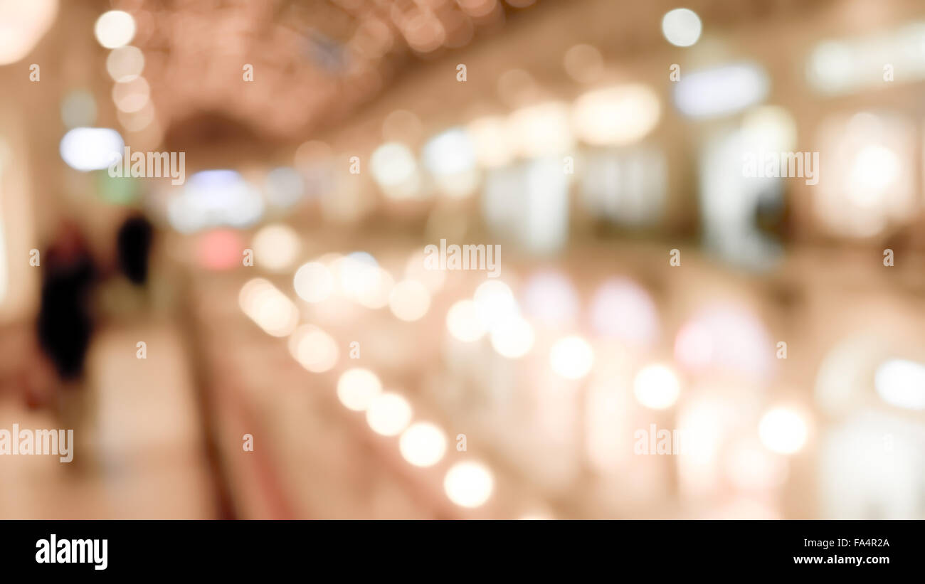 Defocused interior of a large luxury shopping center Stock Photo - Alamy