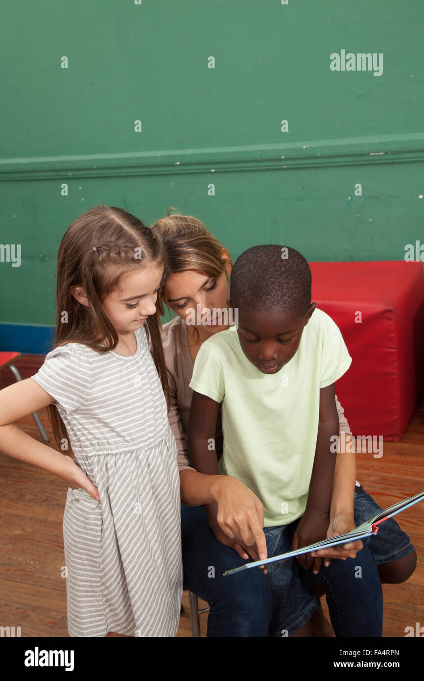 Children learning at school Stock Photo - Alamy