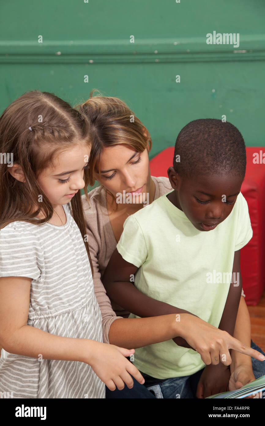 Children learning at school Stock Photo - Alamy