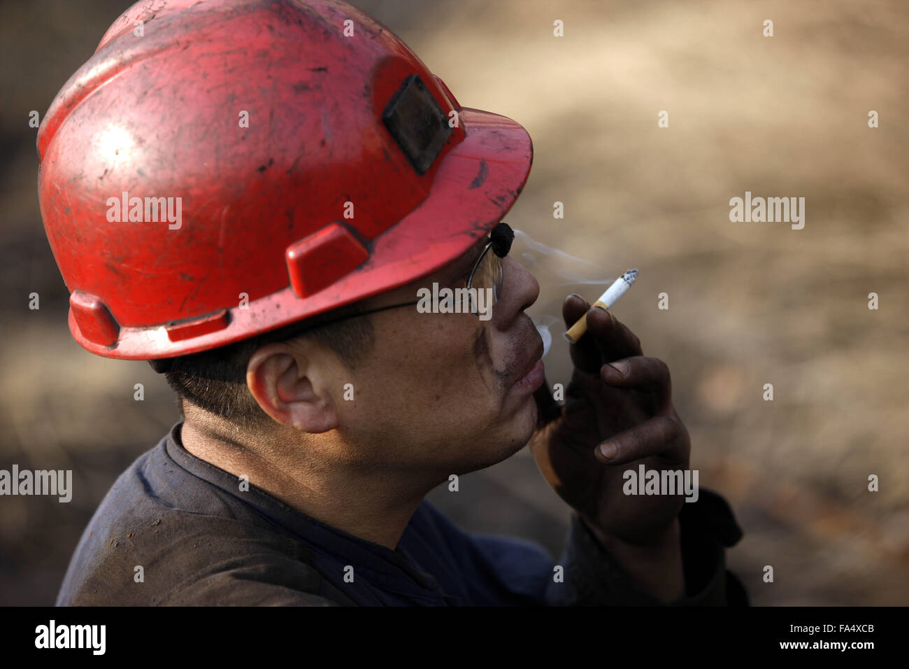 Portraits of Chinese coal miners at a coal in Huaibei, Anhui province ...