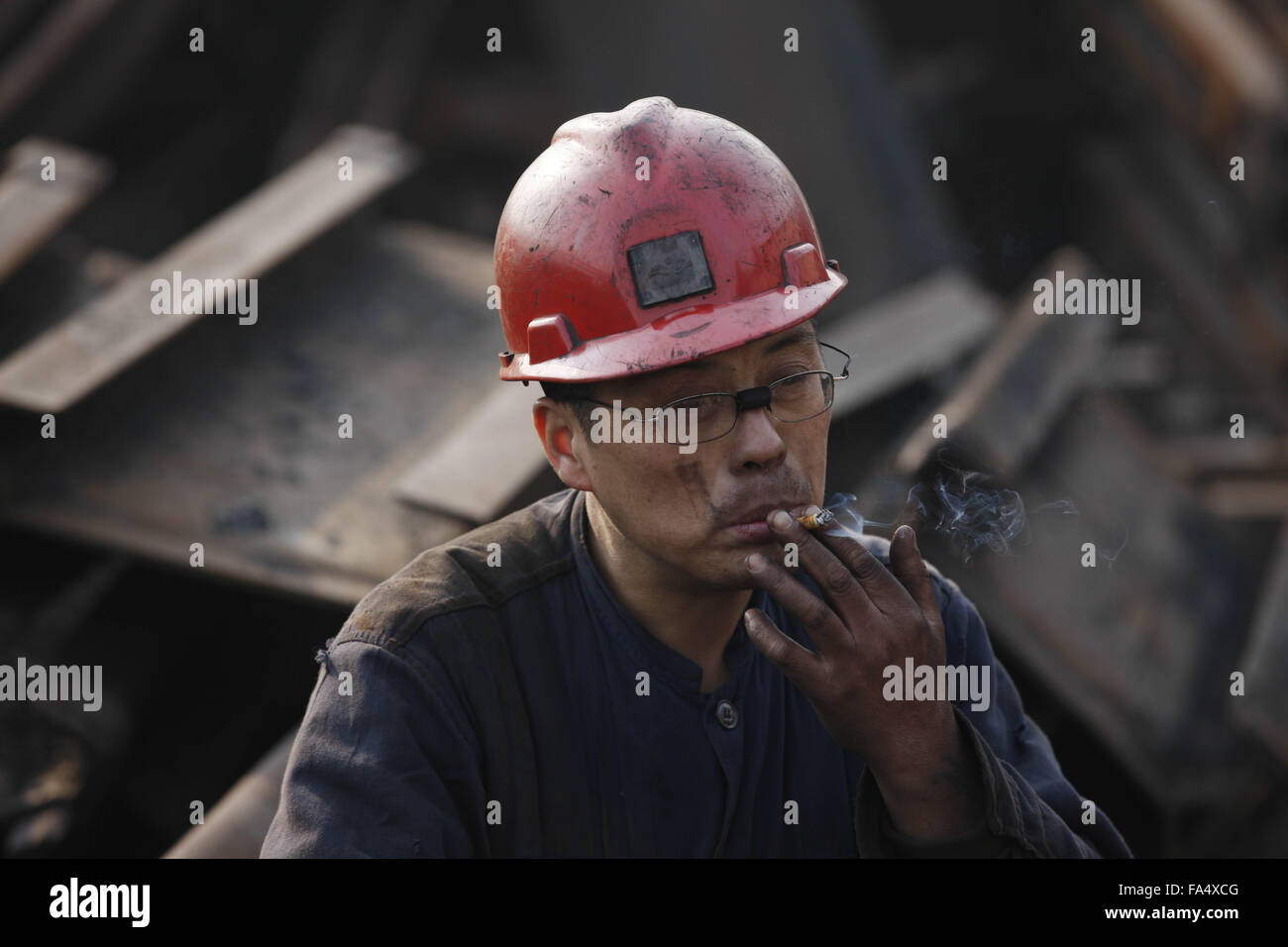 Portraits of Chinese coal miners at a coal in Huaibei, Anhui province ...