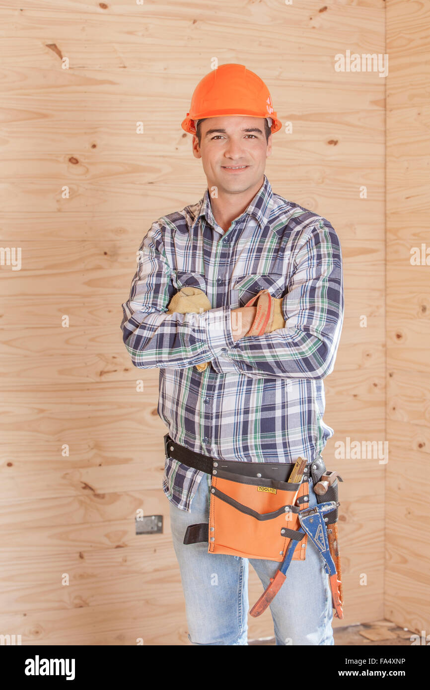 A layman in hard hat on construction site Stock Photo - Alamy