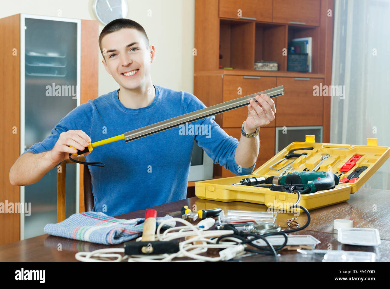 guy with working tools at home Stock Photo - Alamy