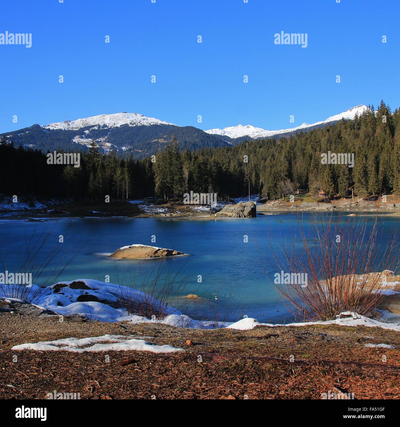 Turquoise lake Cauma in winter Stock Photo - Alamy