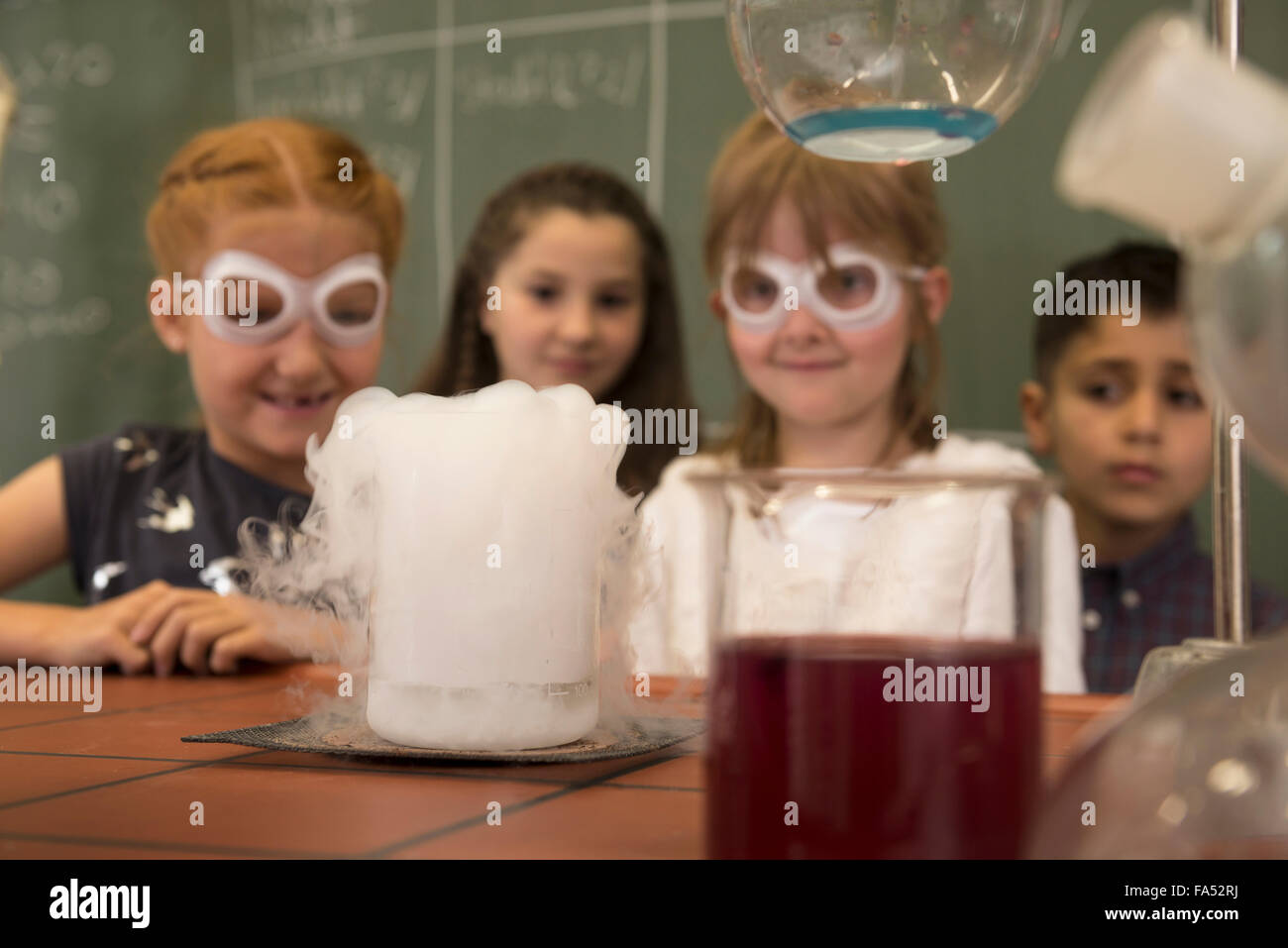 Chemistry class student doing experiment hi-res stock photography and ...