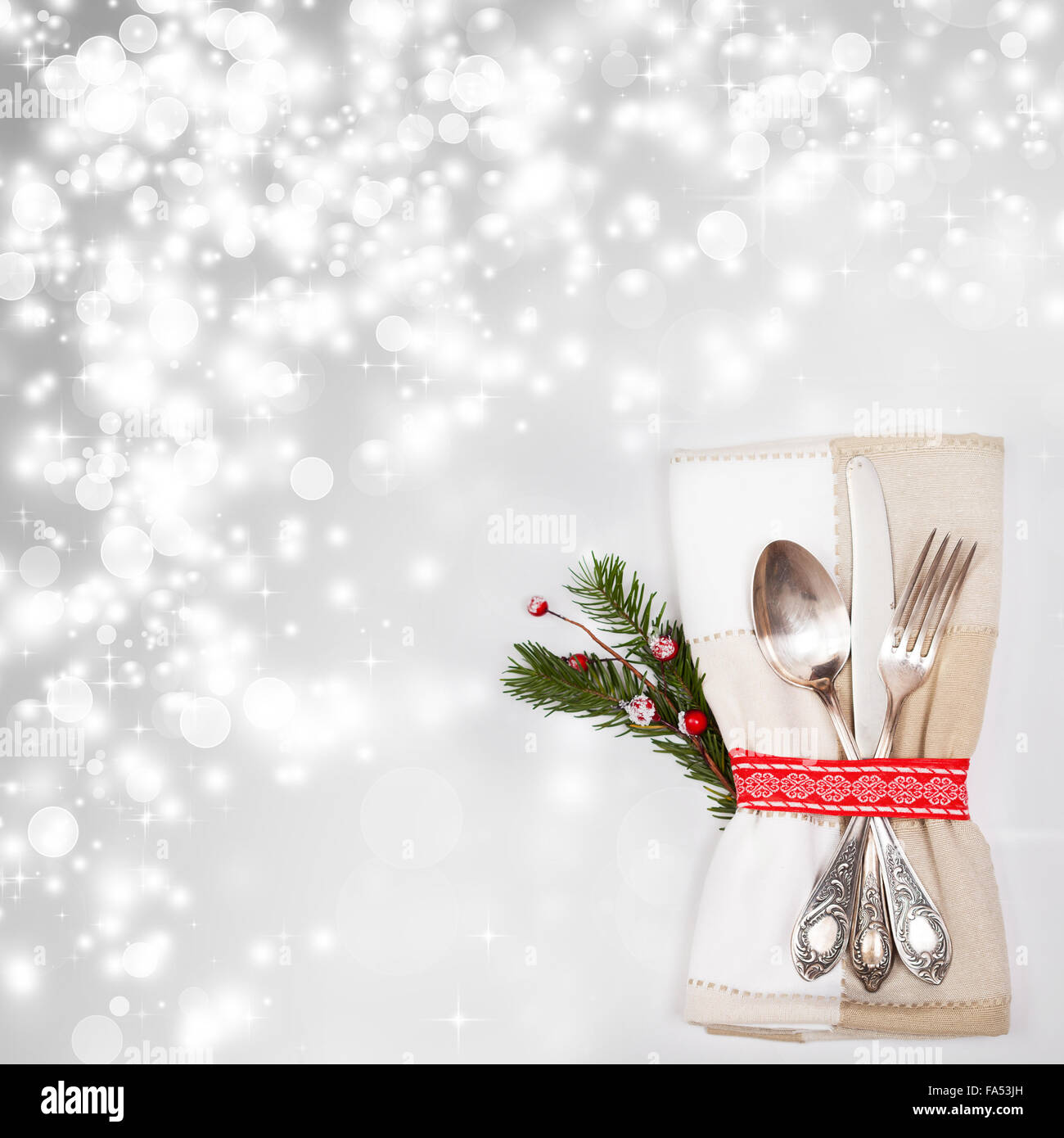 Table place setting on sparkling background Stock Photo - Alamy