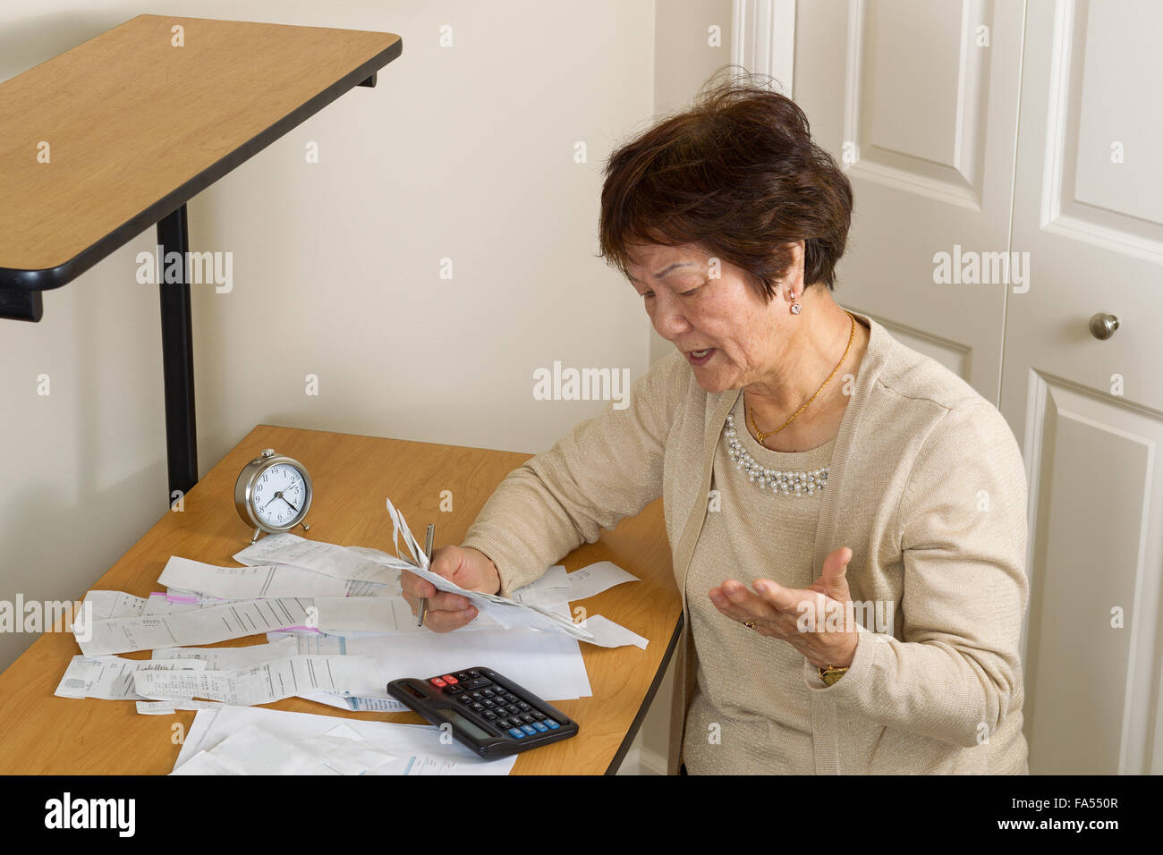 Woman bills stress hi-res stock photography and images - Alamy