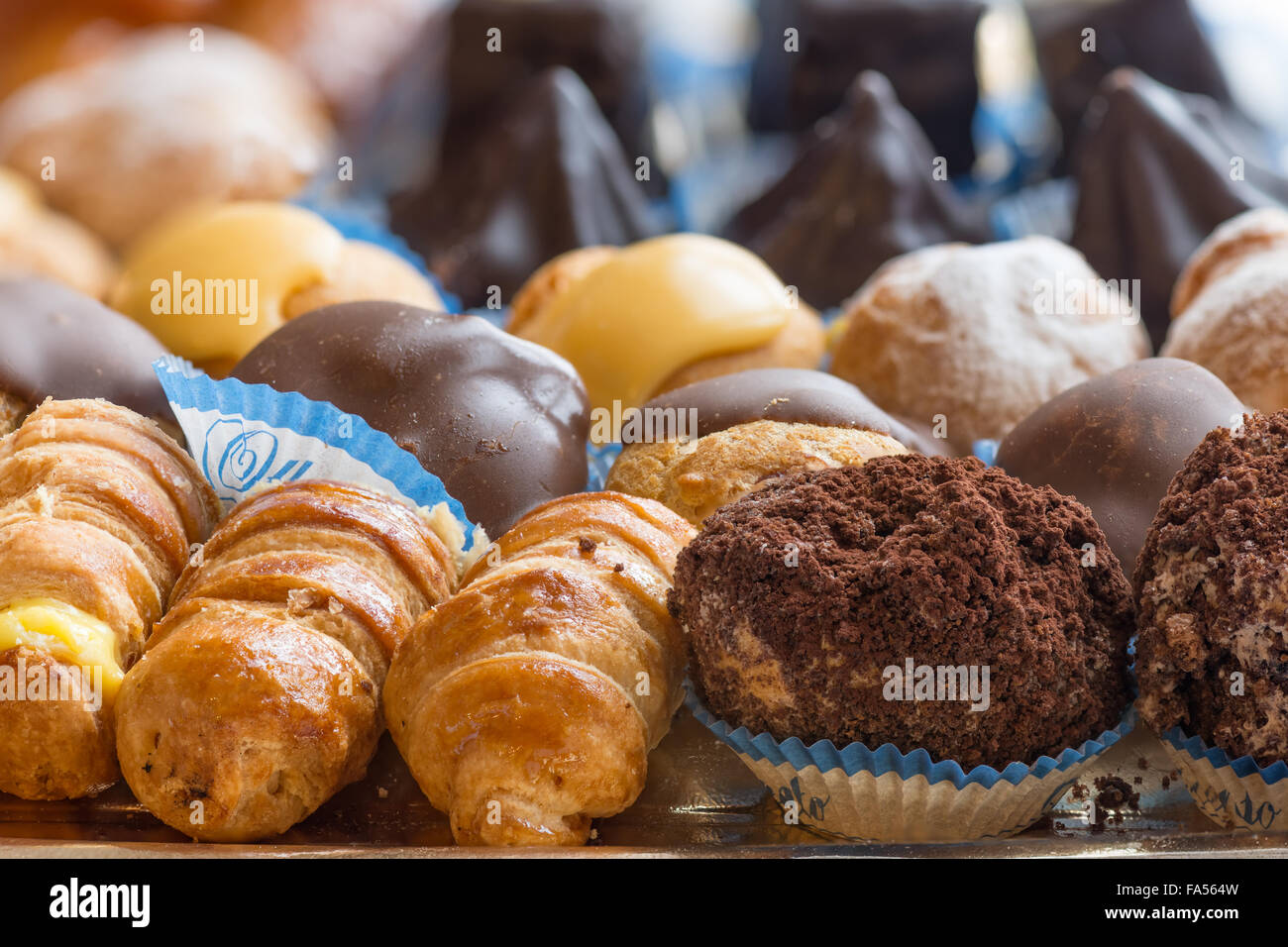 In the pictured colorful pastries with candied,cream and chocolate, the ...