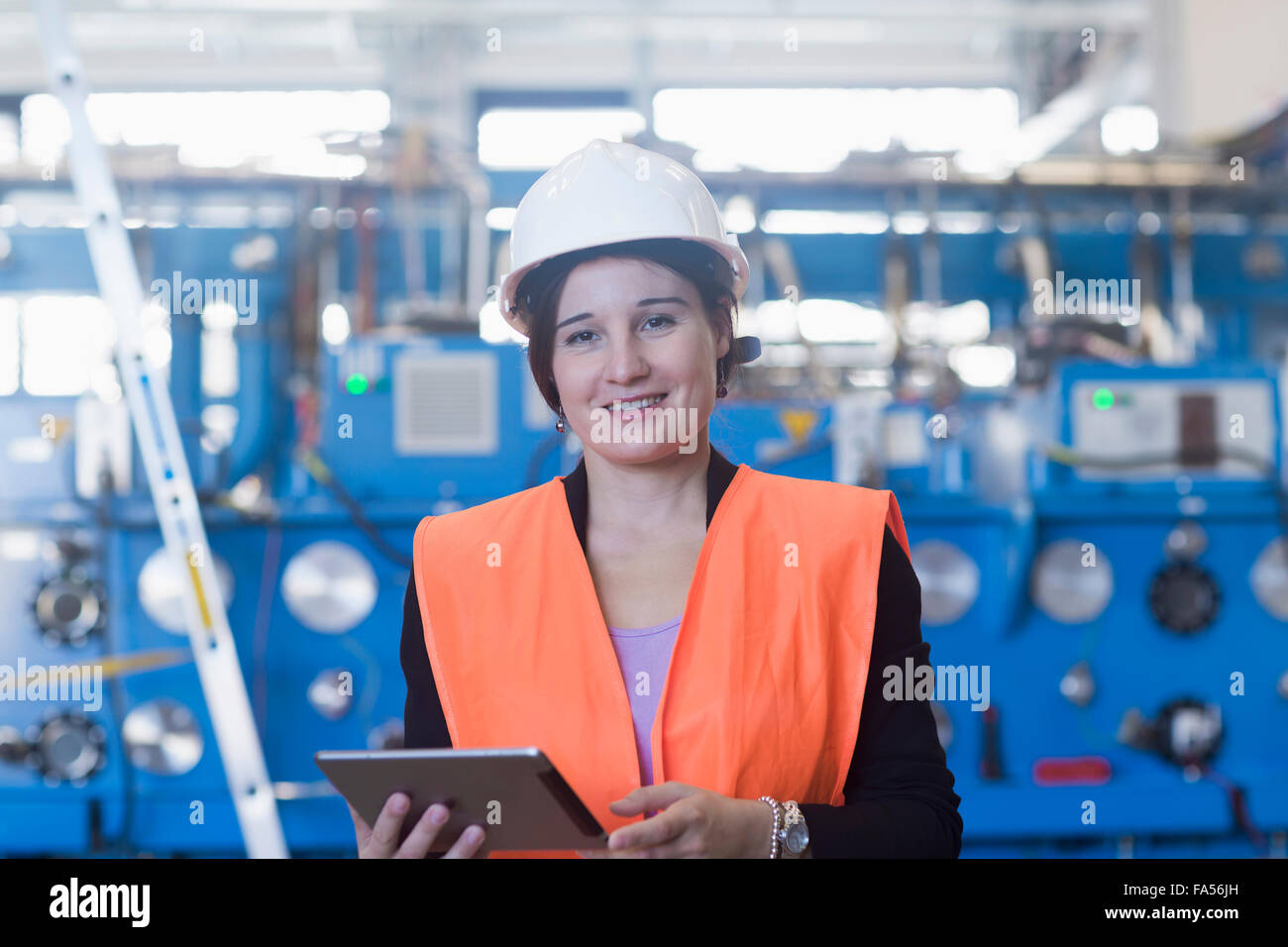 One lady examining and holding a hat hi-res stock photography and ...