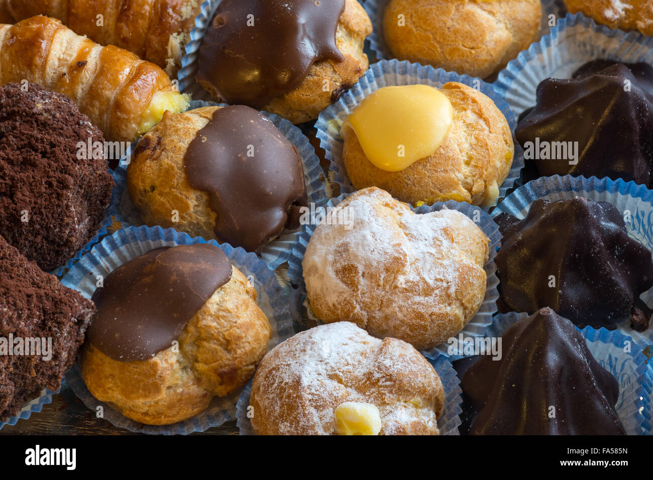 In the pictured colorful pastries with candied,cream and chocolate from ...