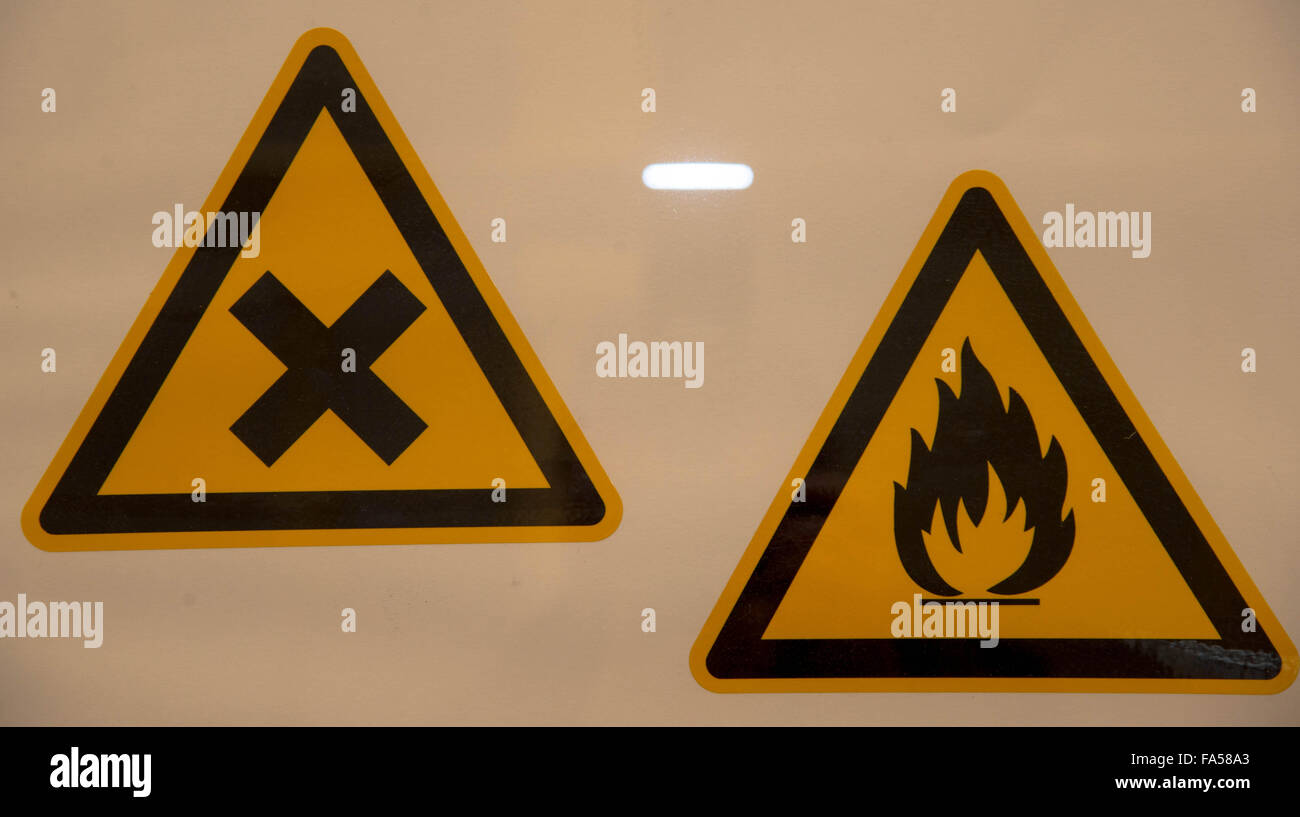 yellow warning signs in science classroom at highschool Stock Photo - Alamy