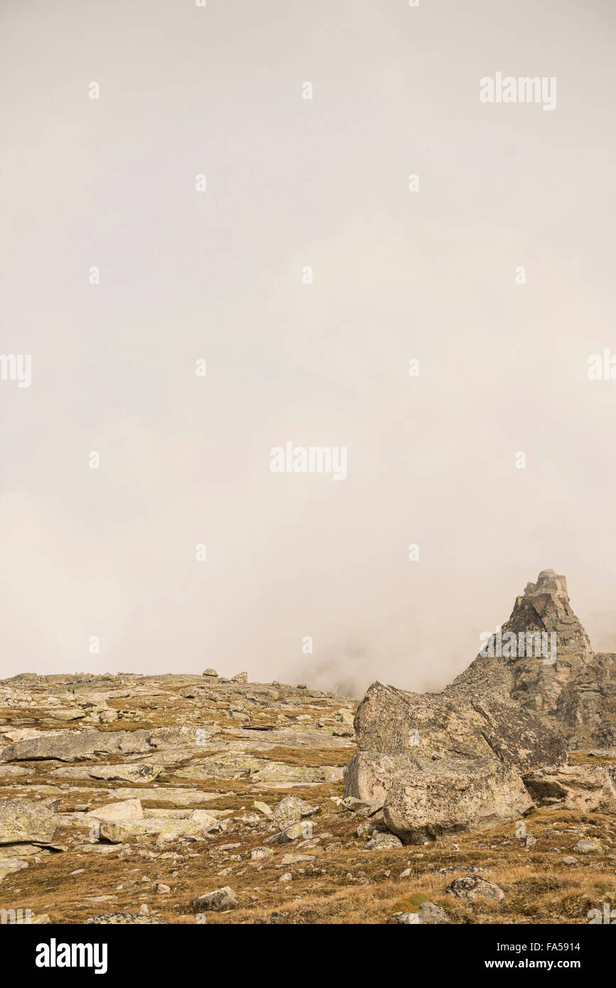 Rock formation on mountain in misty morning, Austrian Alps, Zirmsee ...