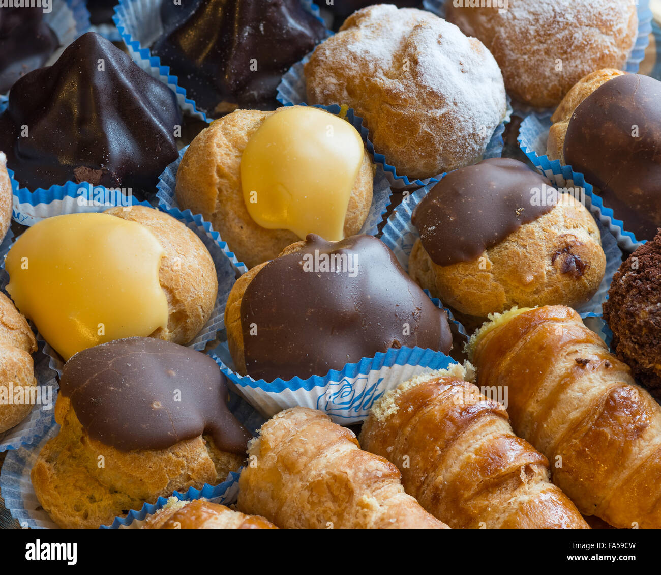 In the pictured colorful pastries with candied,cream and chocolate from ...