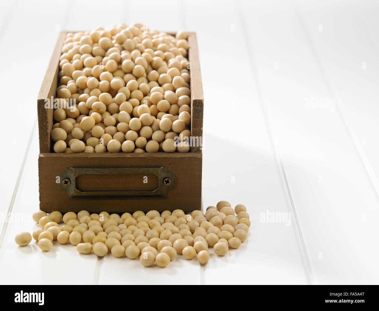 soy beans in a wooden container Stock Photo - Alamy