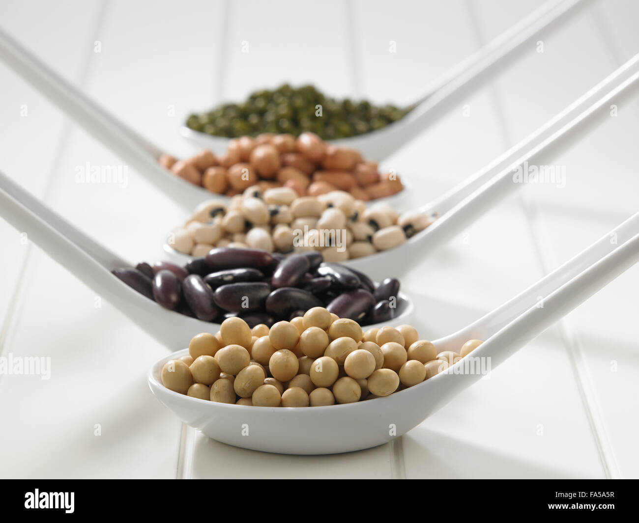 variety of beans group in five spoons Stock Photo - Alamy