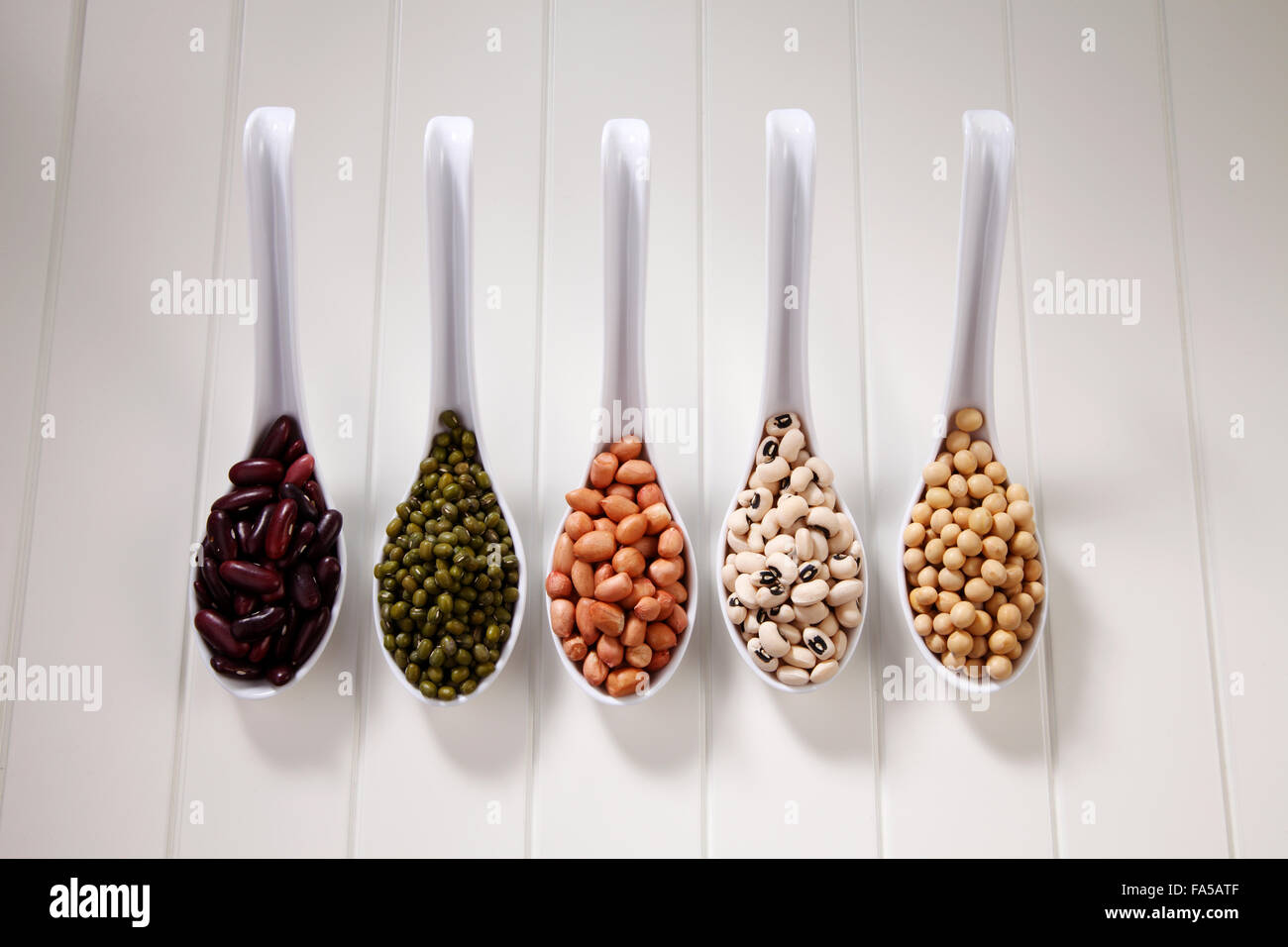 variety of beans group in five spoons Stock Photo - Alamy